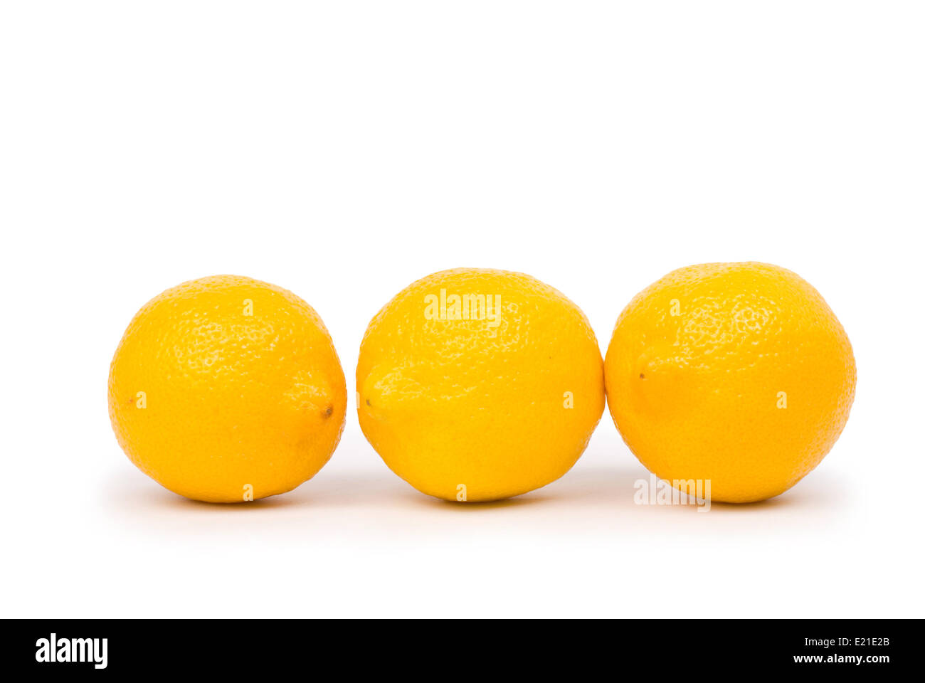 golden lemon in a row Stock Photo - Alamy