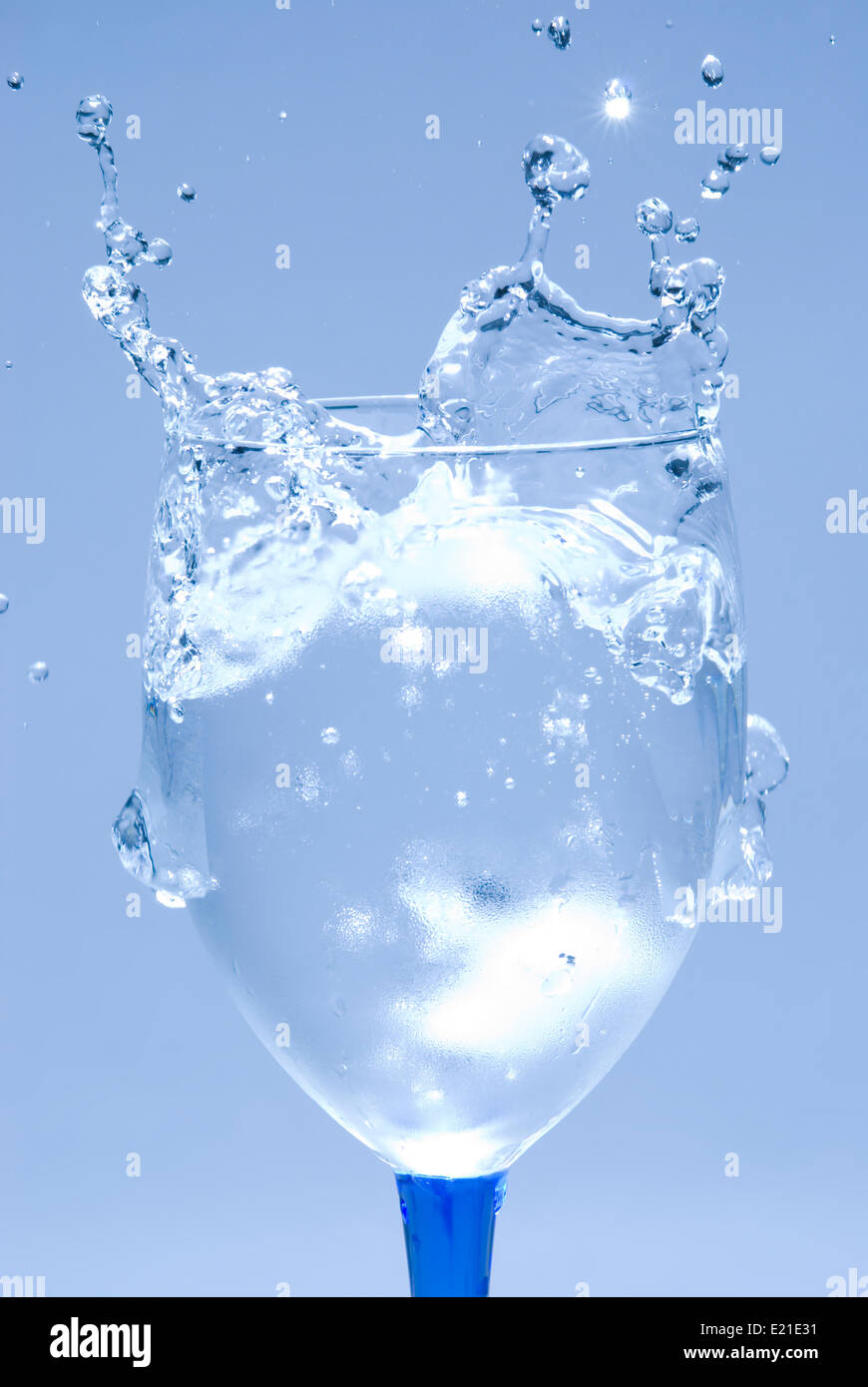 ice splashing water in glass Stock Photo - Alamy