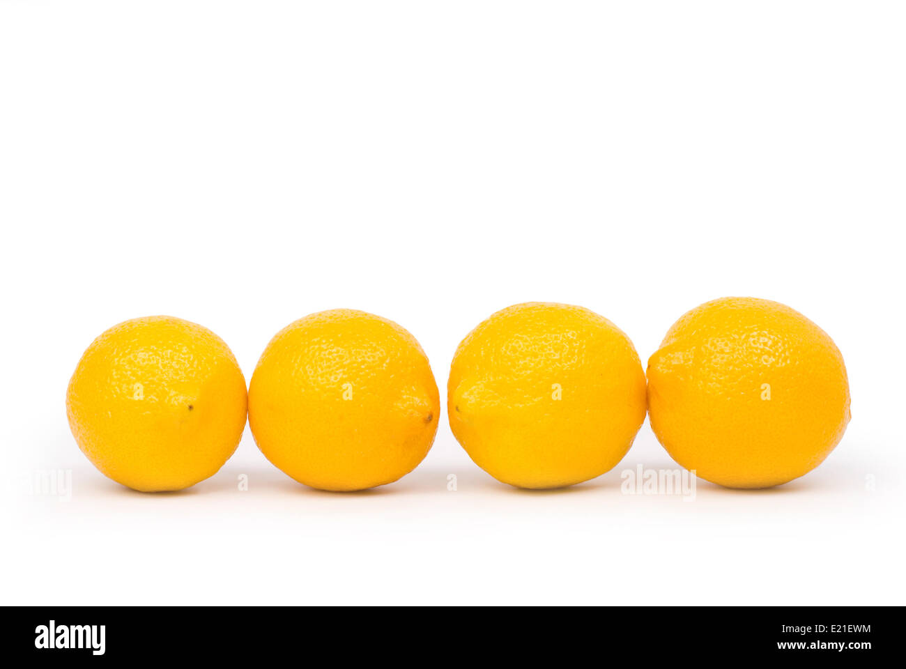 golden lemon in a row Stock Photo - Alamy