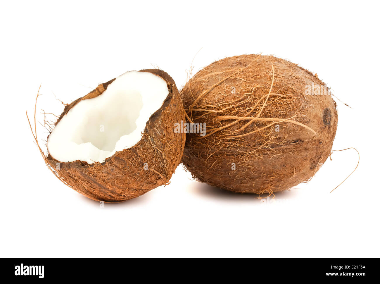 Full and half of coconut Stock Photo - Alamy