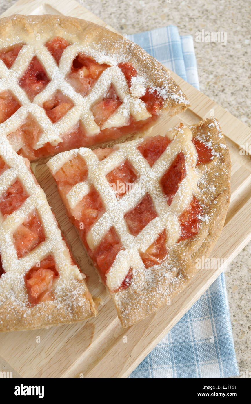 Strawberry and apple lattice pie with a slice cut out Stock Photo - Alamy