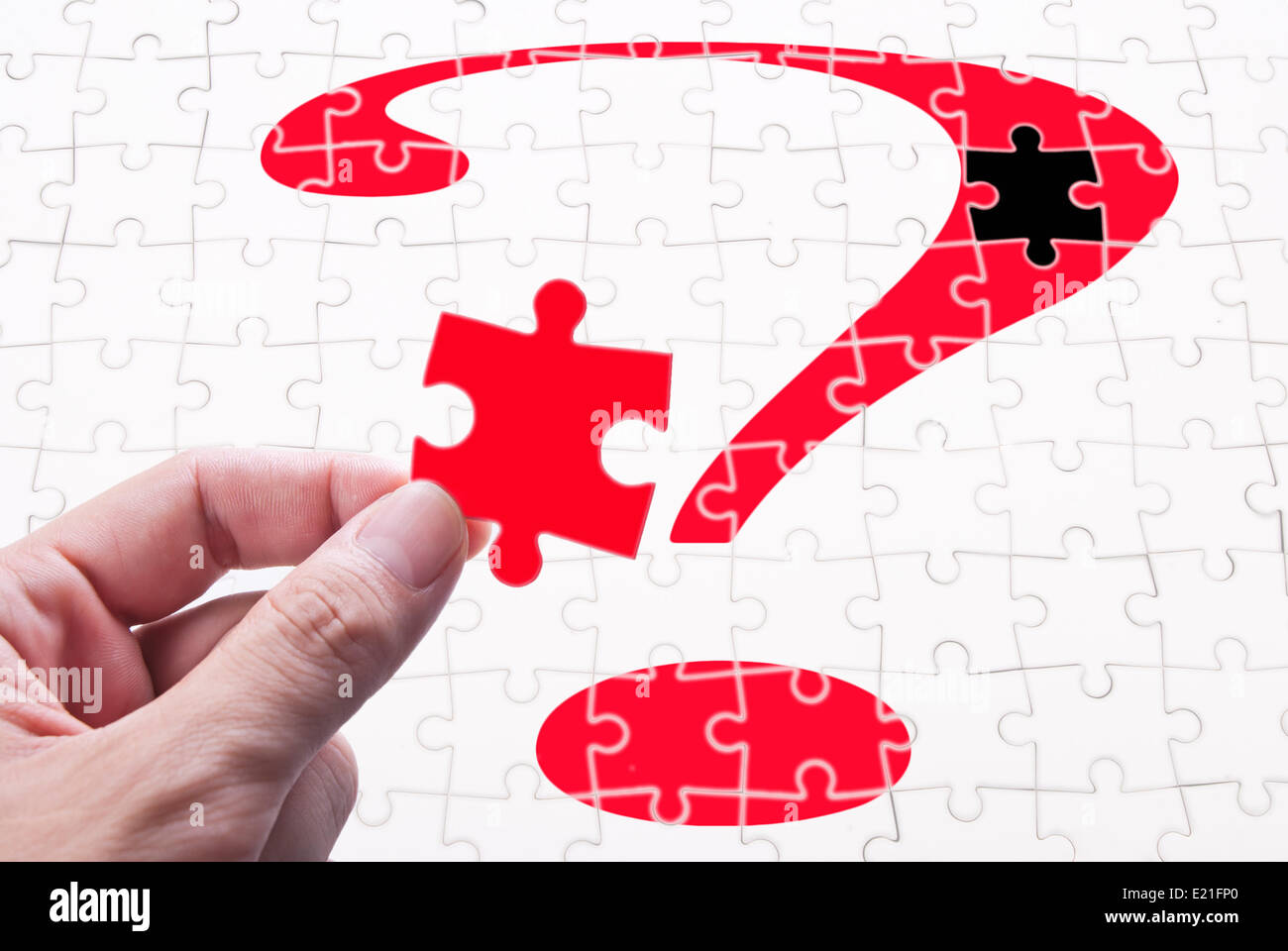 Question mark, hand and puzzle game Stock Photo - Alamy