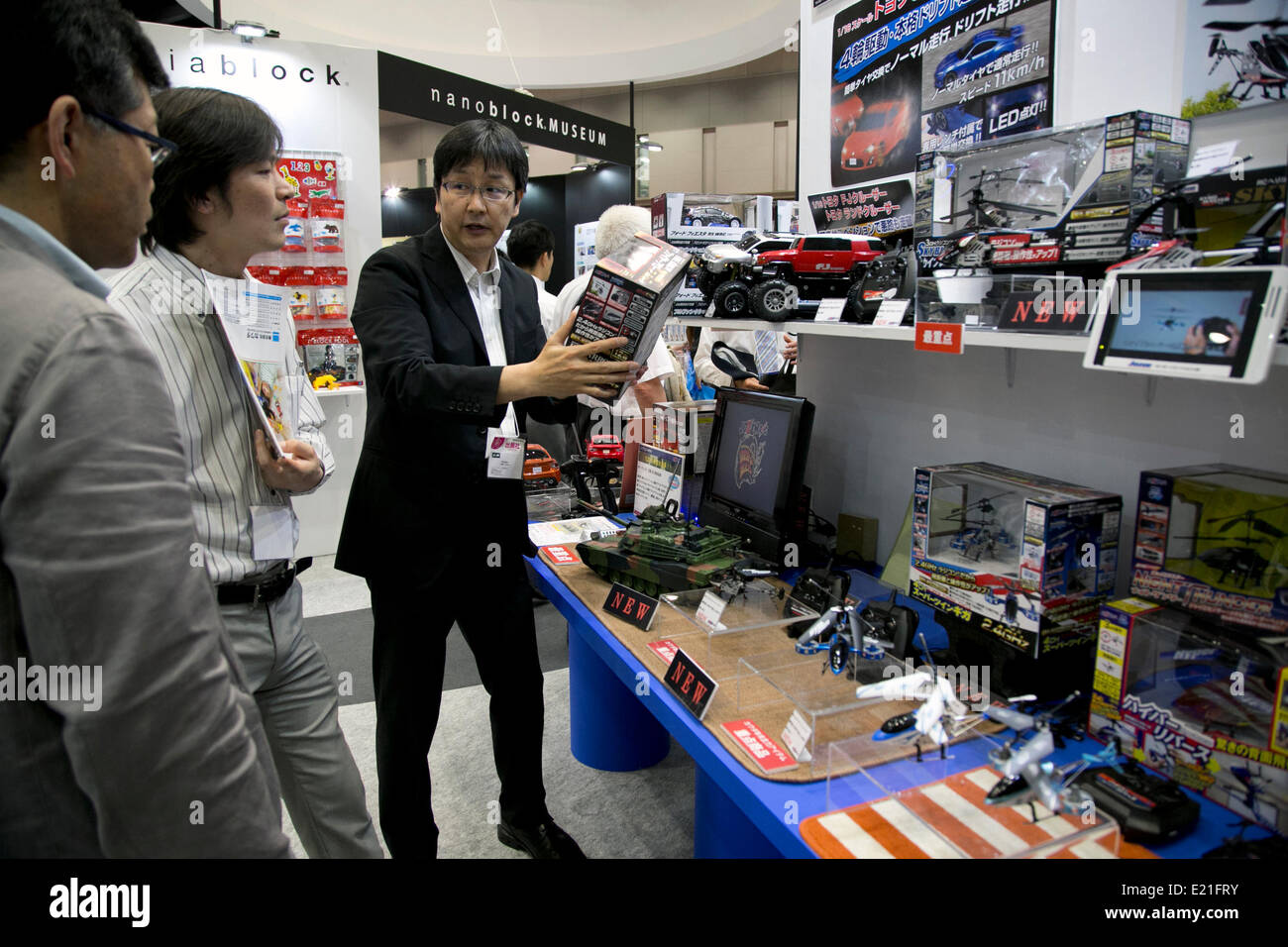Tokyo, Japan. 13th June, 2014. An exhibitor shows their products during ...