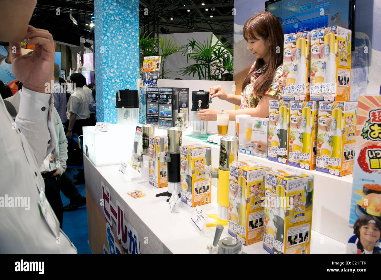Tokyo, Japan. 13th June, 2014. Exhibitors show their products during ...
