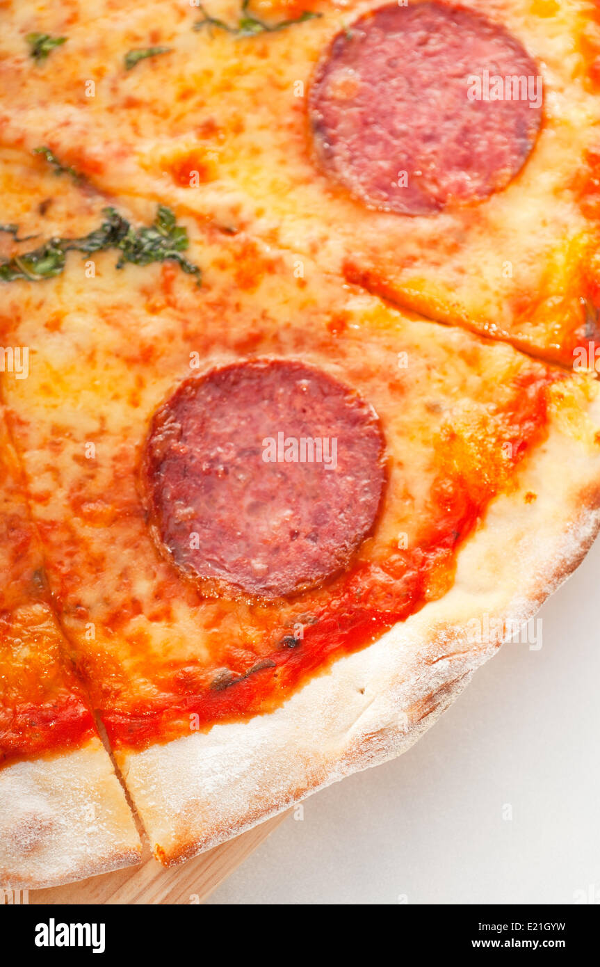 Italian original thin crust pepperoni pizza Stock Photo - Alamy