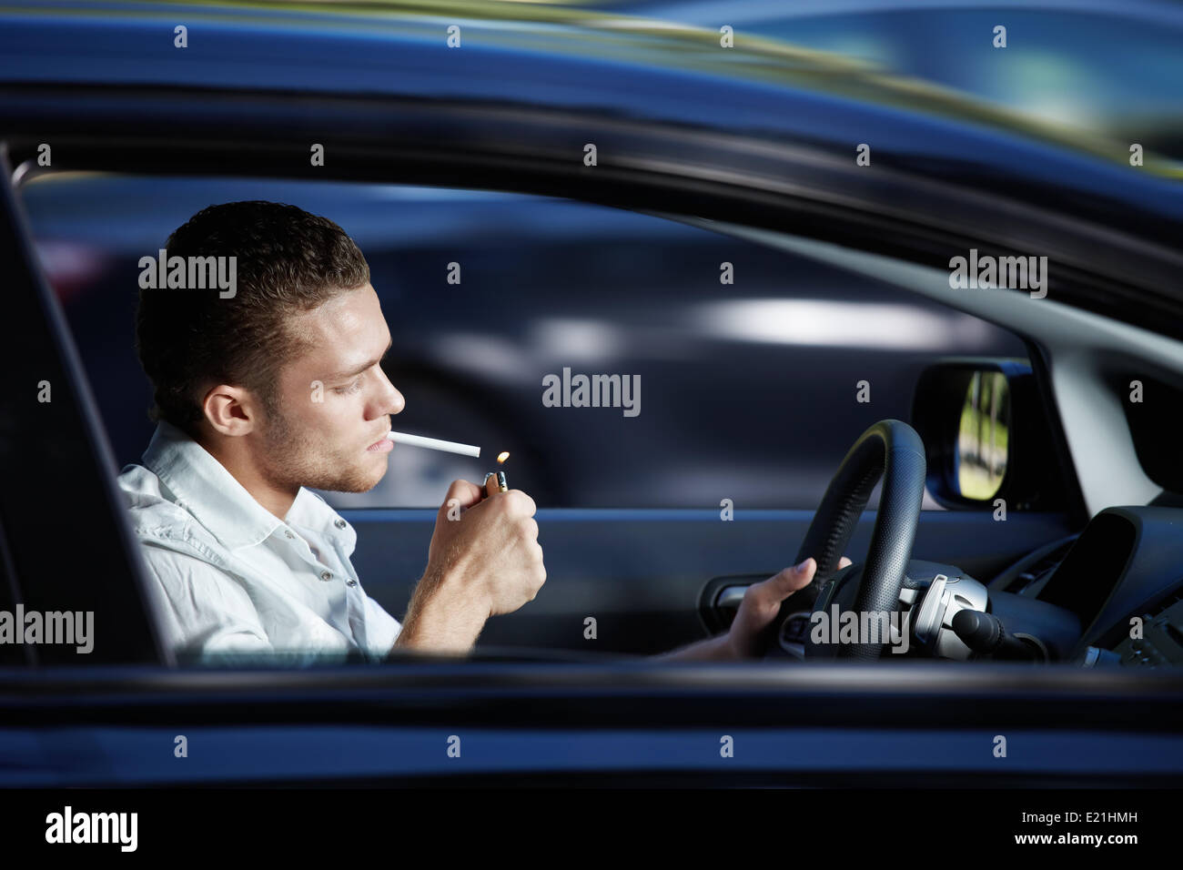 Smoking in the car hi-res stock photography and images - Alamy