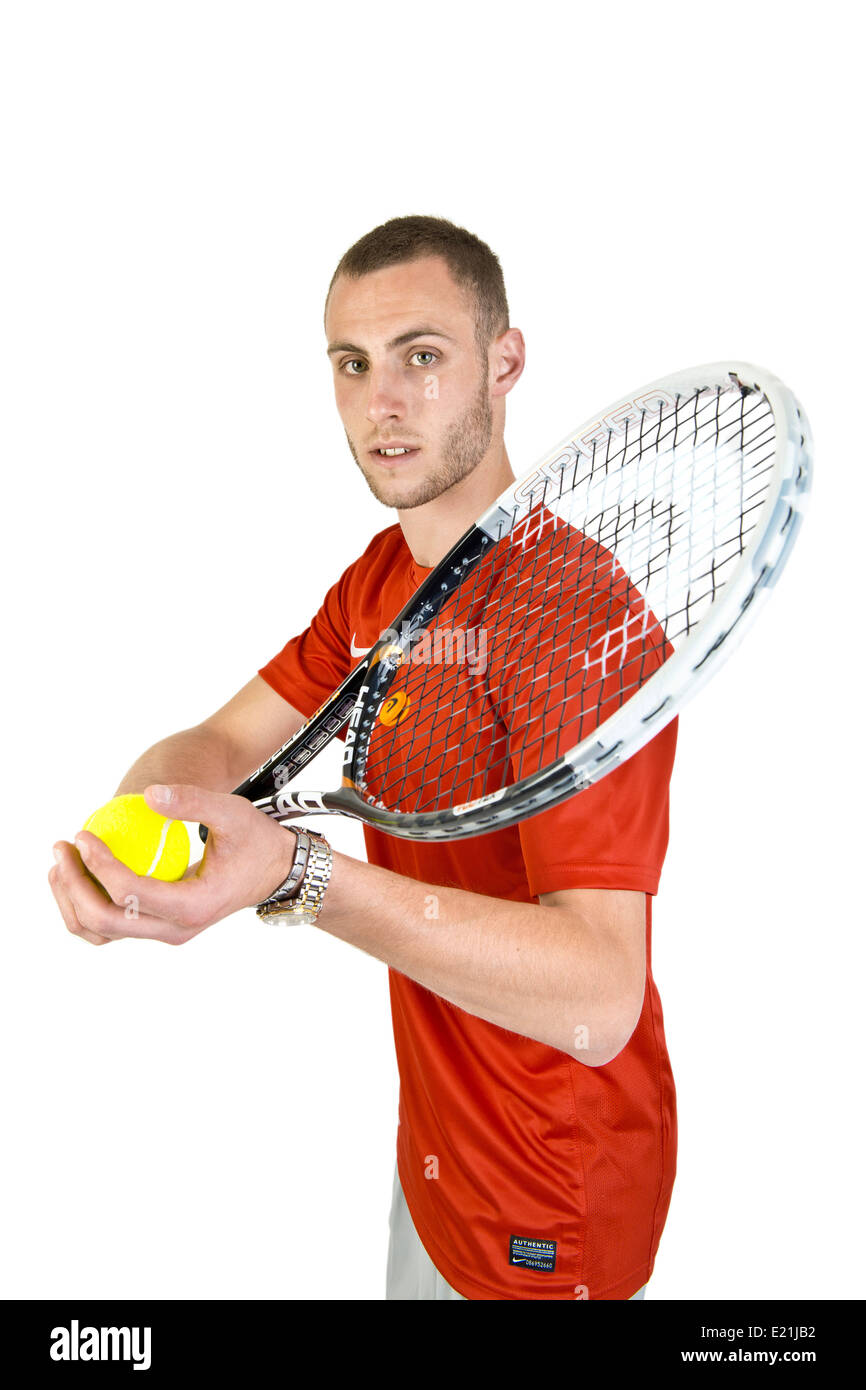 Young man playing tennis Stock Photo - Alamy