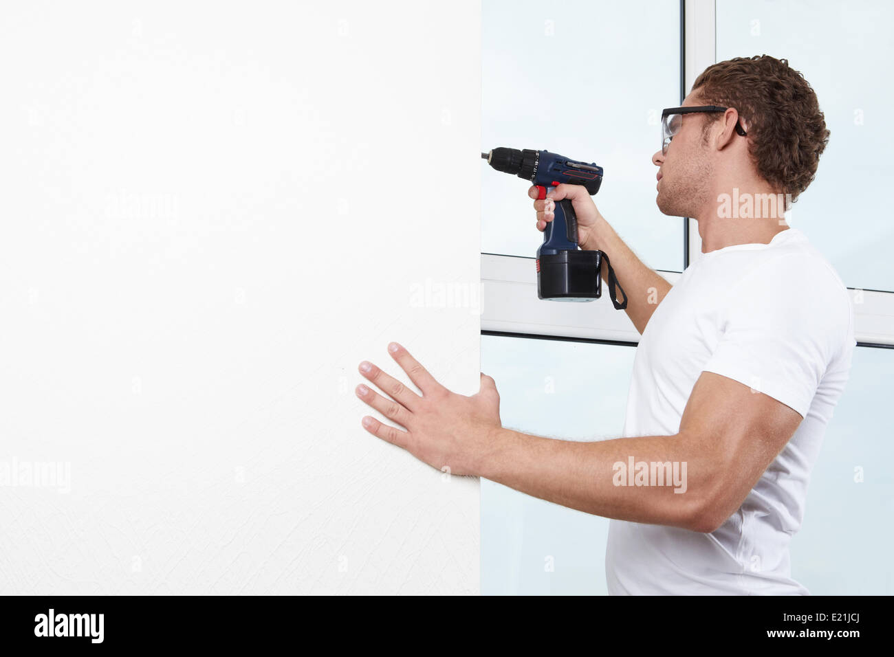 House repair man muscle hi-res stock photography and images - Alamy