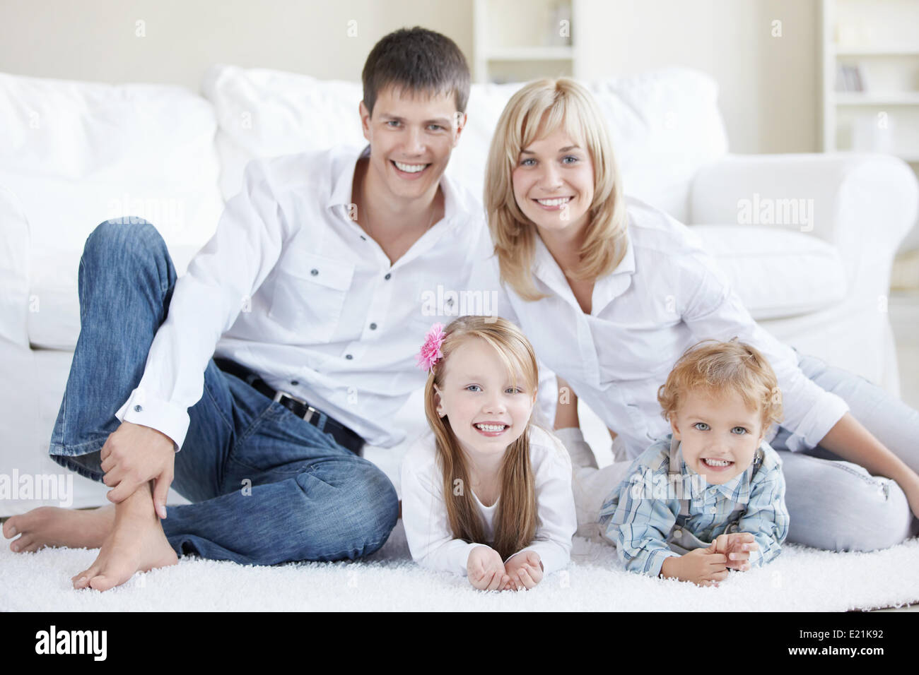 Positive family with children at home Stock Photo - Alamy