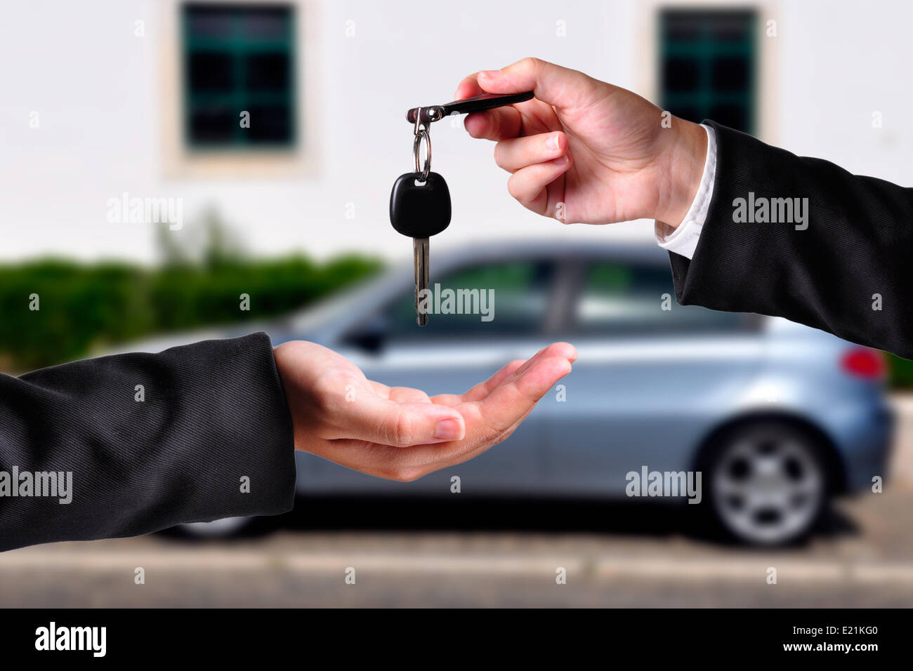 Handing over the keys Stock Photo - Alamy
