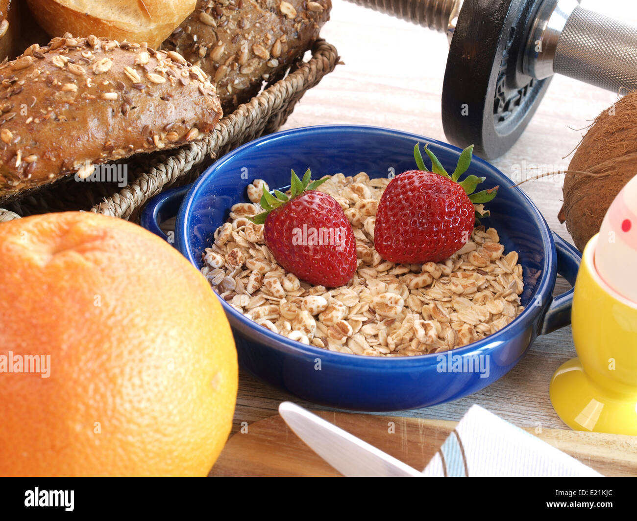Whole grain rolls with fresh fruits and sports equipment Stock Photo ...