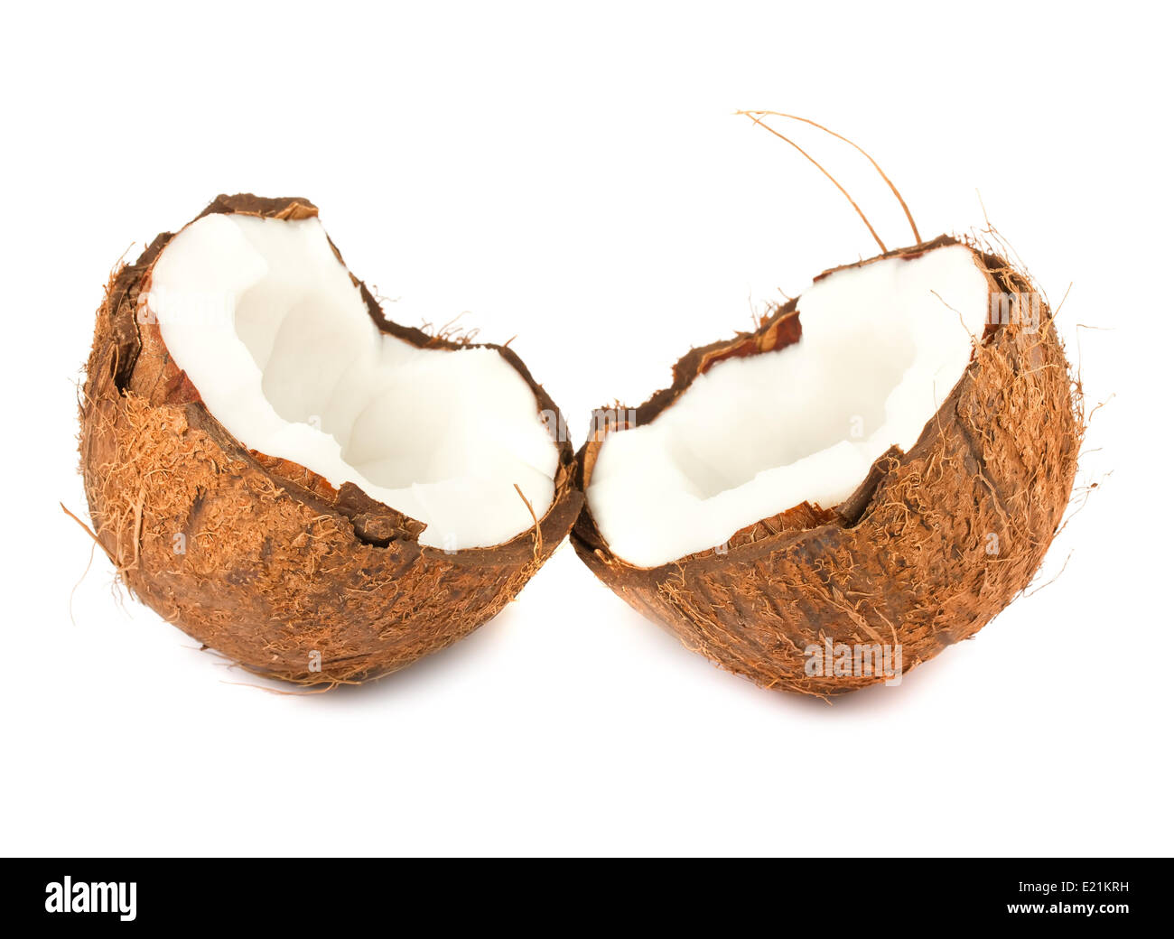Two halves of coconut Stock Photo - Alamy