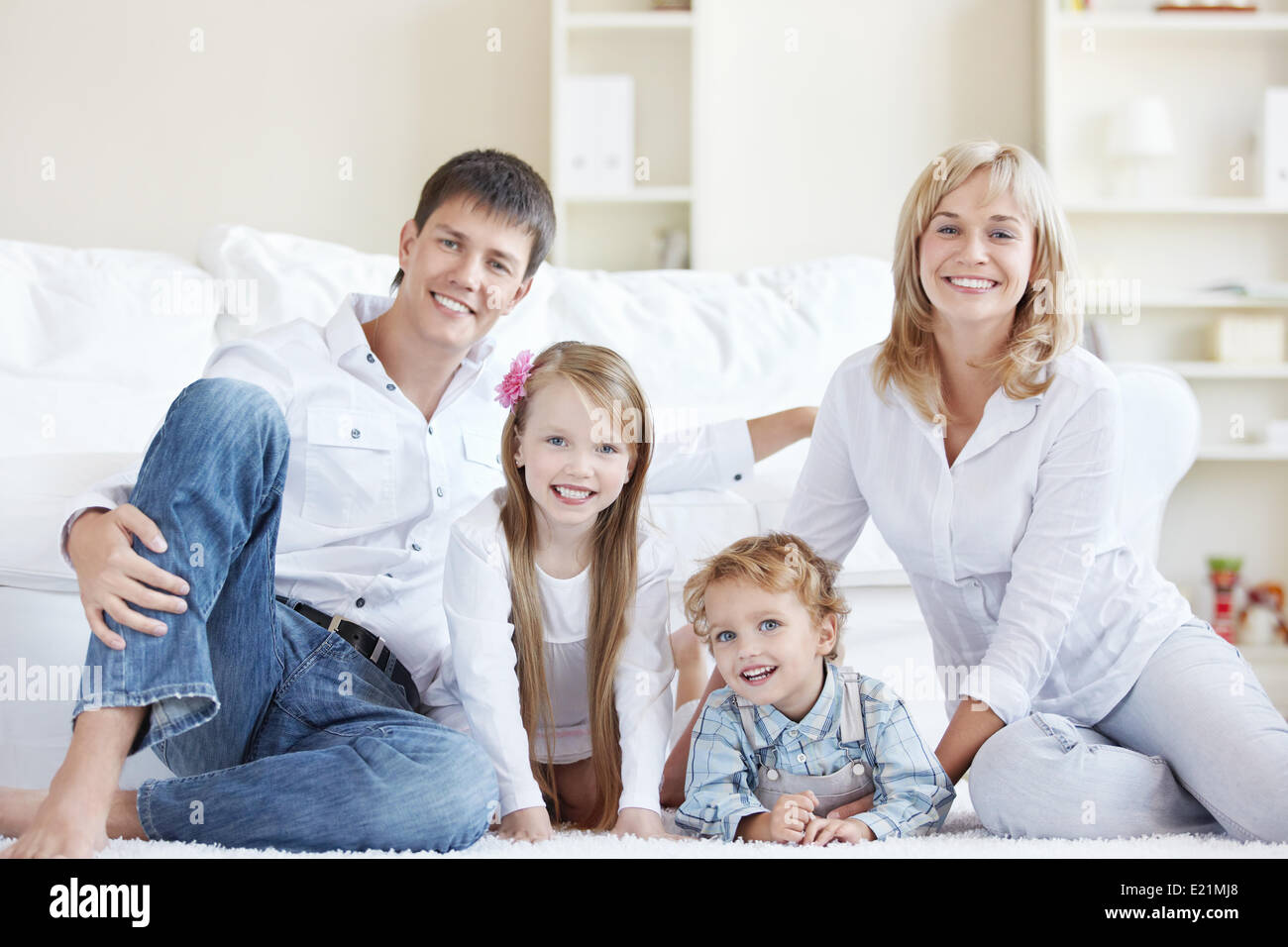 A happy family with children at home Stock Photo - Alamy