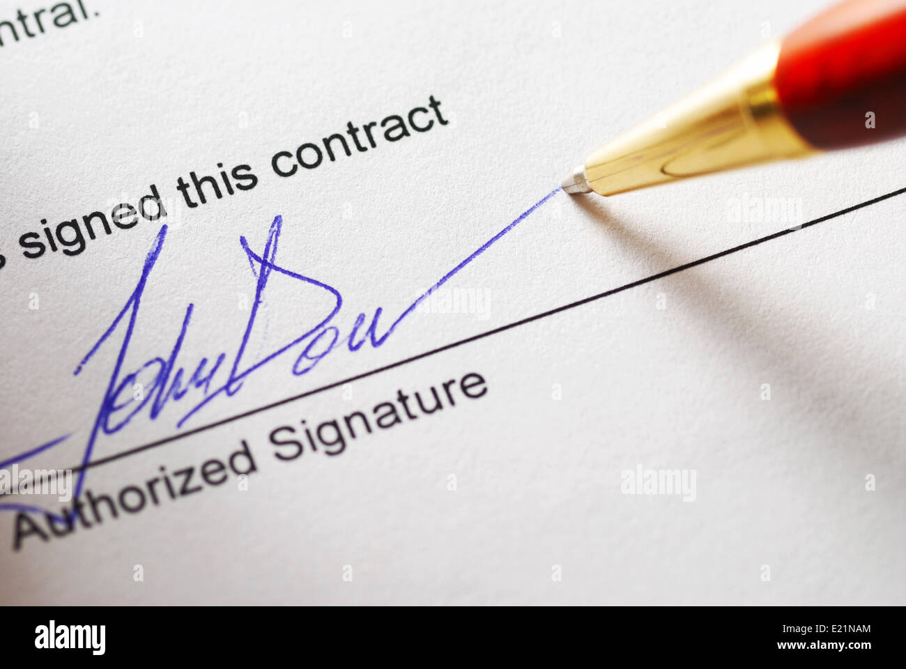 Signing a contract Stock Photo - Alamy
