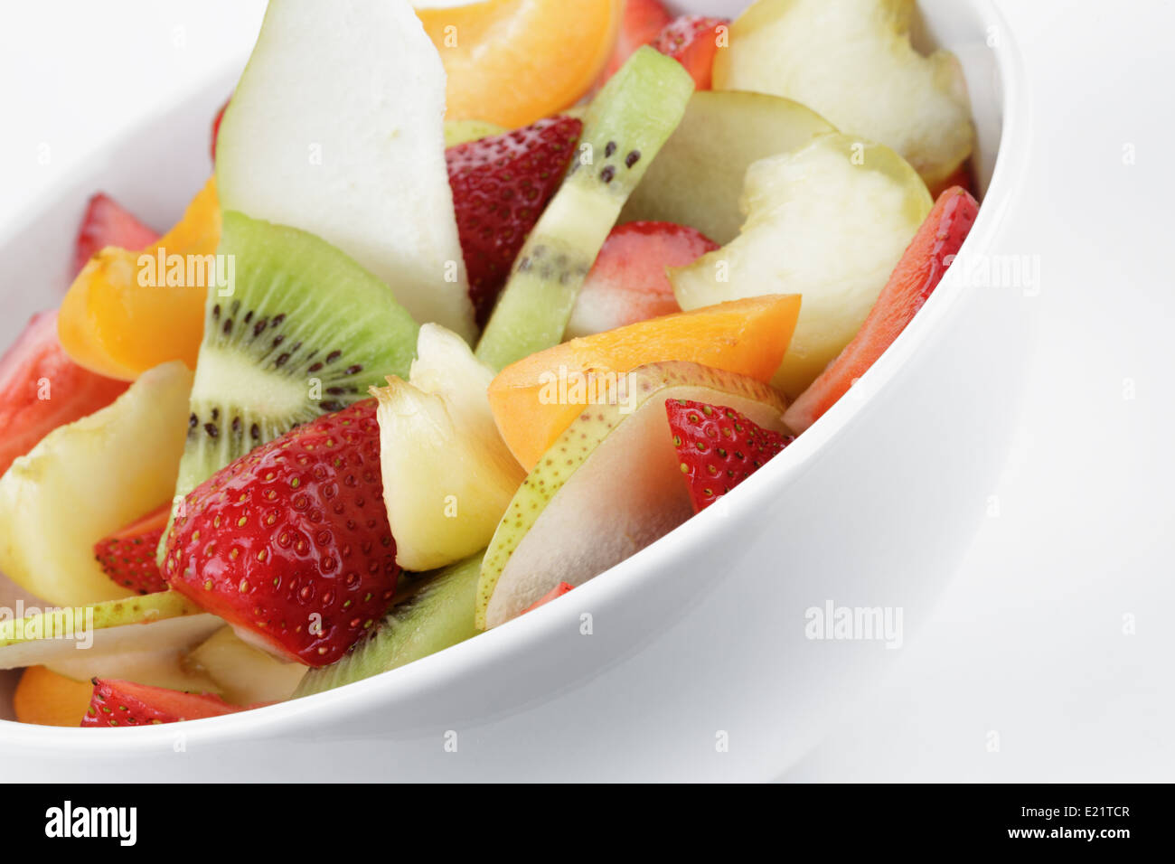 fresh mix fruit salad with strawberry, kiwi and peach, close up Stock ...