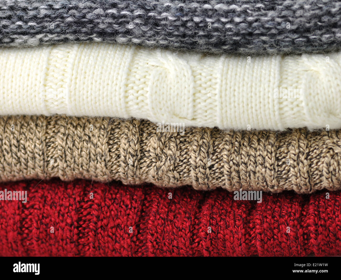 Stack of sweaters Stock Photo - Alamy