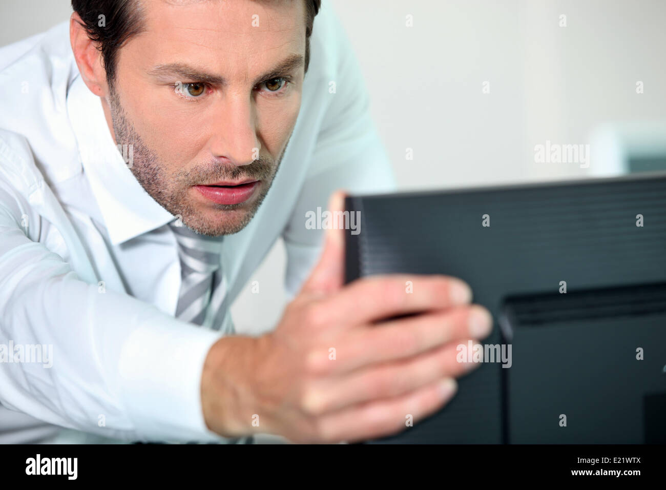 close-up of a man with computer Stock Photo - Alamy