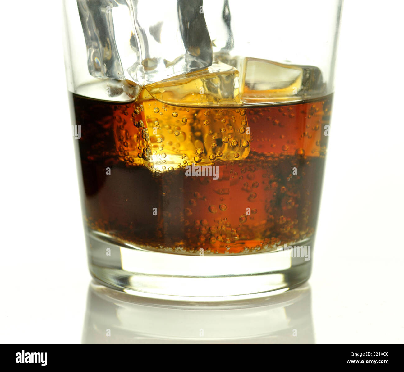 glass of cola with ice cubes Stock Photo - Alamy