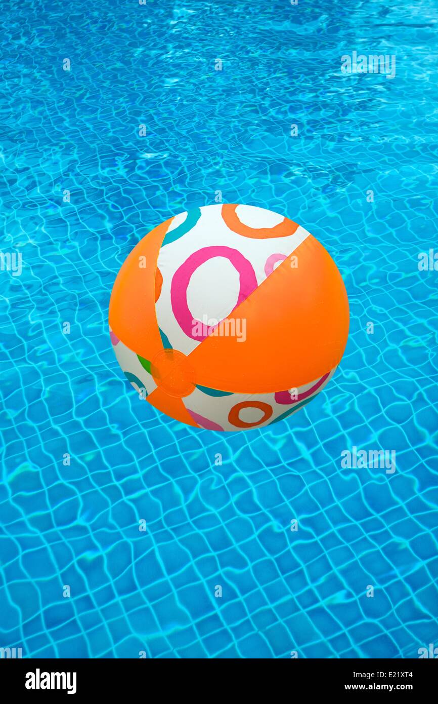 Swimming Pool and a beach ball Stock Photo - Alamy