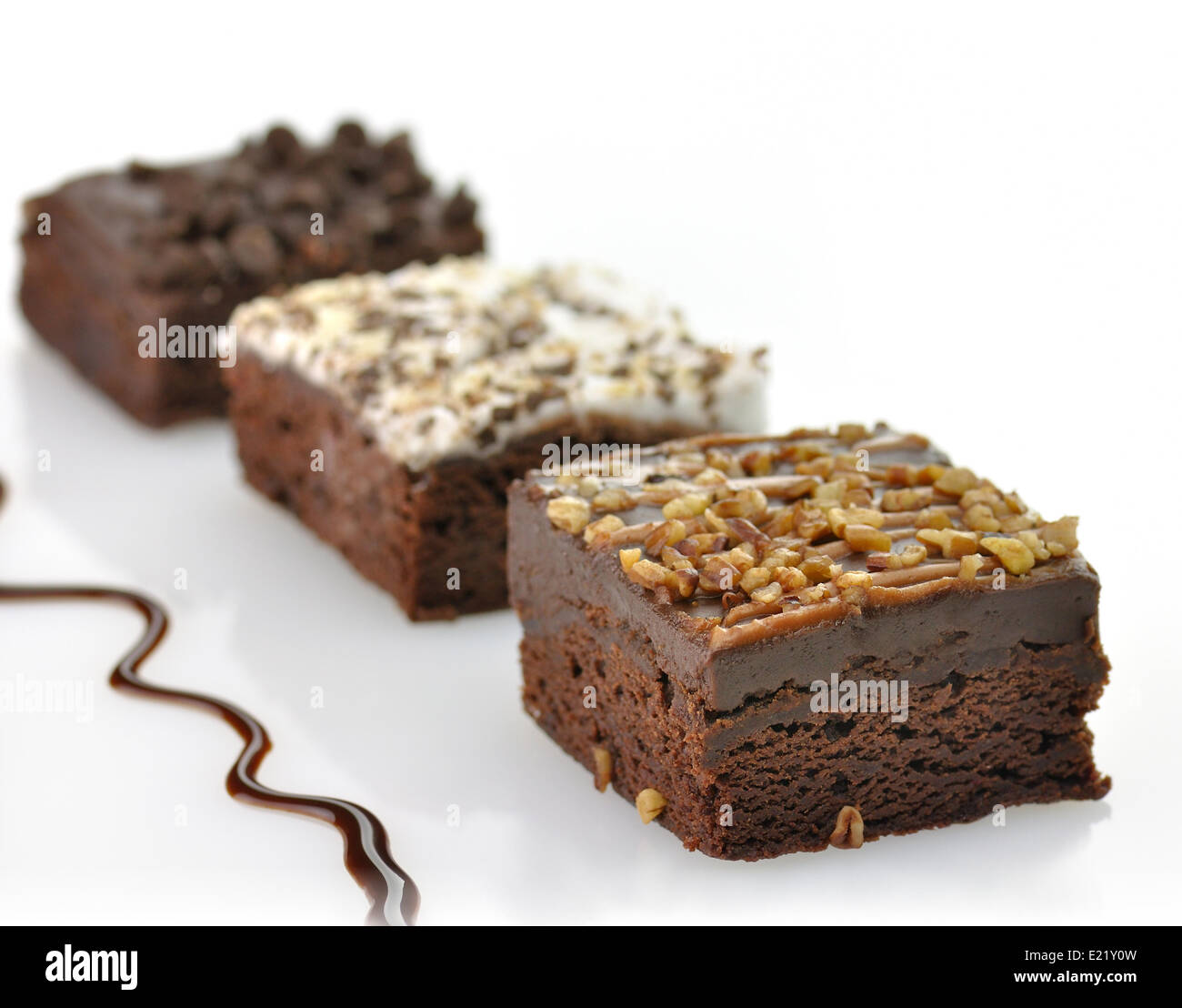 Brownies with chocolate sauce hi-res stock photography and images - Alamy