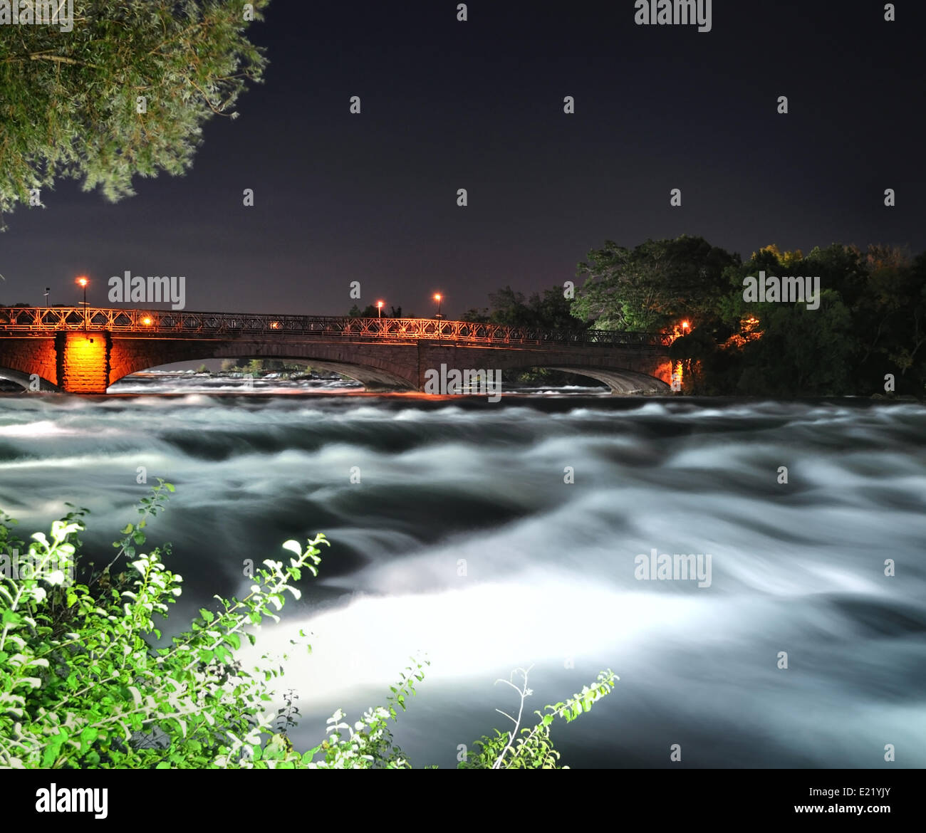 mountain river with bridge at the night time Stock Photo - Alamy
