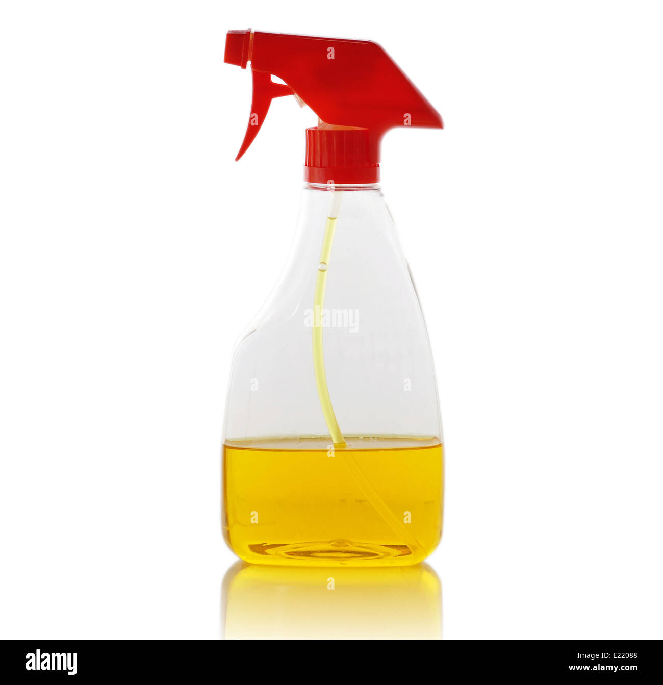 spray bottle with yellow liquid Stock Photo - Alamy