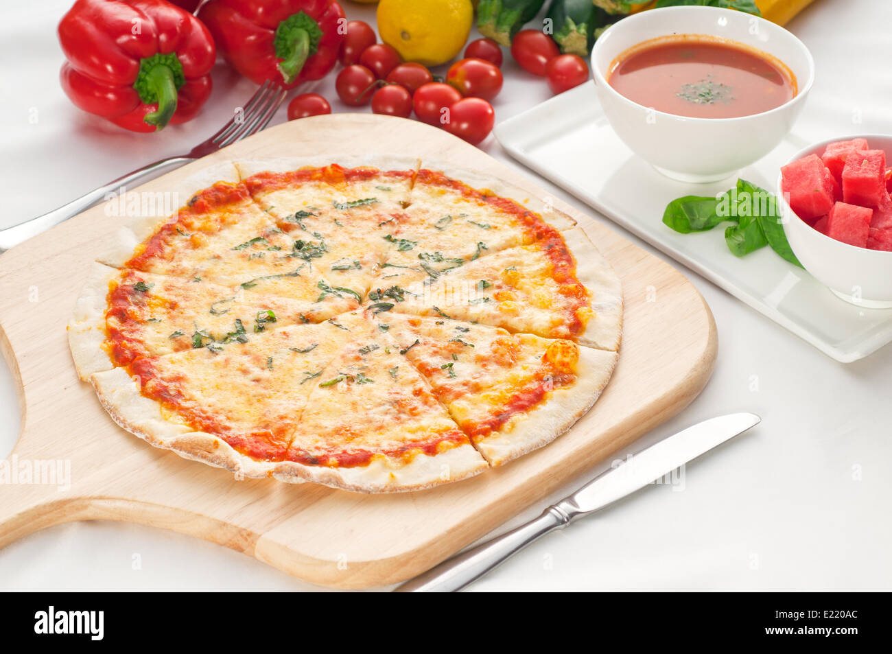 Italian original thin crust pepperoni pizza Stock Photo - Alamy