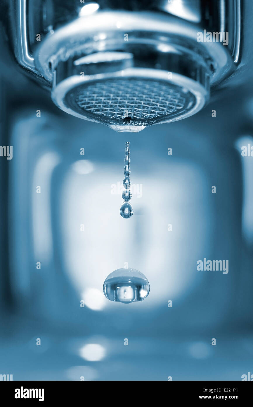 Water drop from a faucet Stock Photo - Alamy