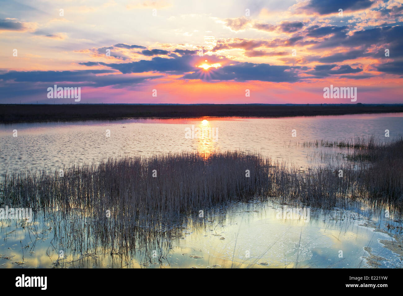sunset over lake Stock Photo - Alamy