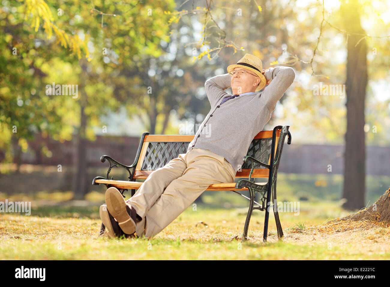 Senior person seated bench hi-res stock photography and images - Alamy