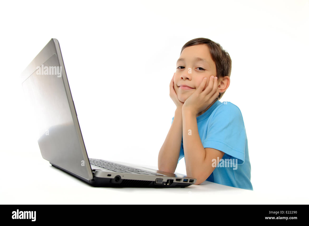 Boy with laptop isolated on white background Stock Photo - Alamy