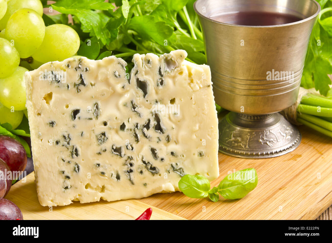Round cheese slice blue hi-res stock photography and images - Alamy