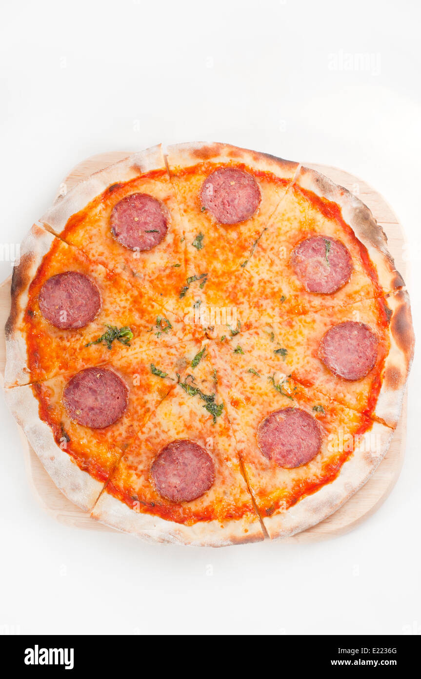 Italian original thin crust pepperoni pizza Stock Photo - Alamy