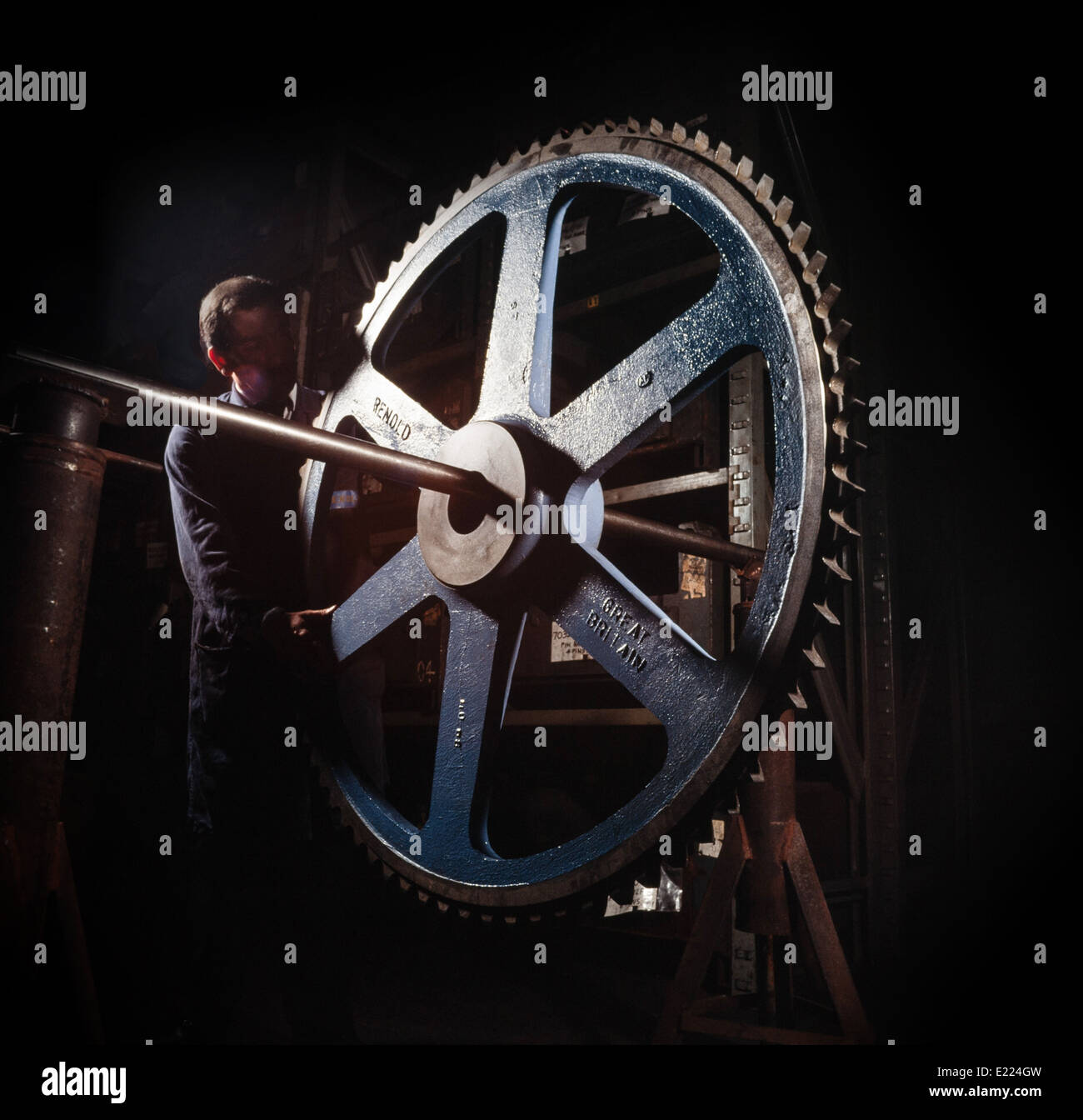 Inspecting very large gear wheel Stock Photo - Alamy