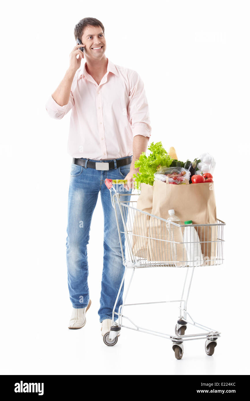 Man with bags of food Cut Out Stock Images & Pictures - Alamy