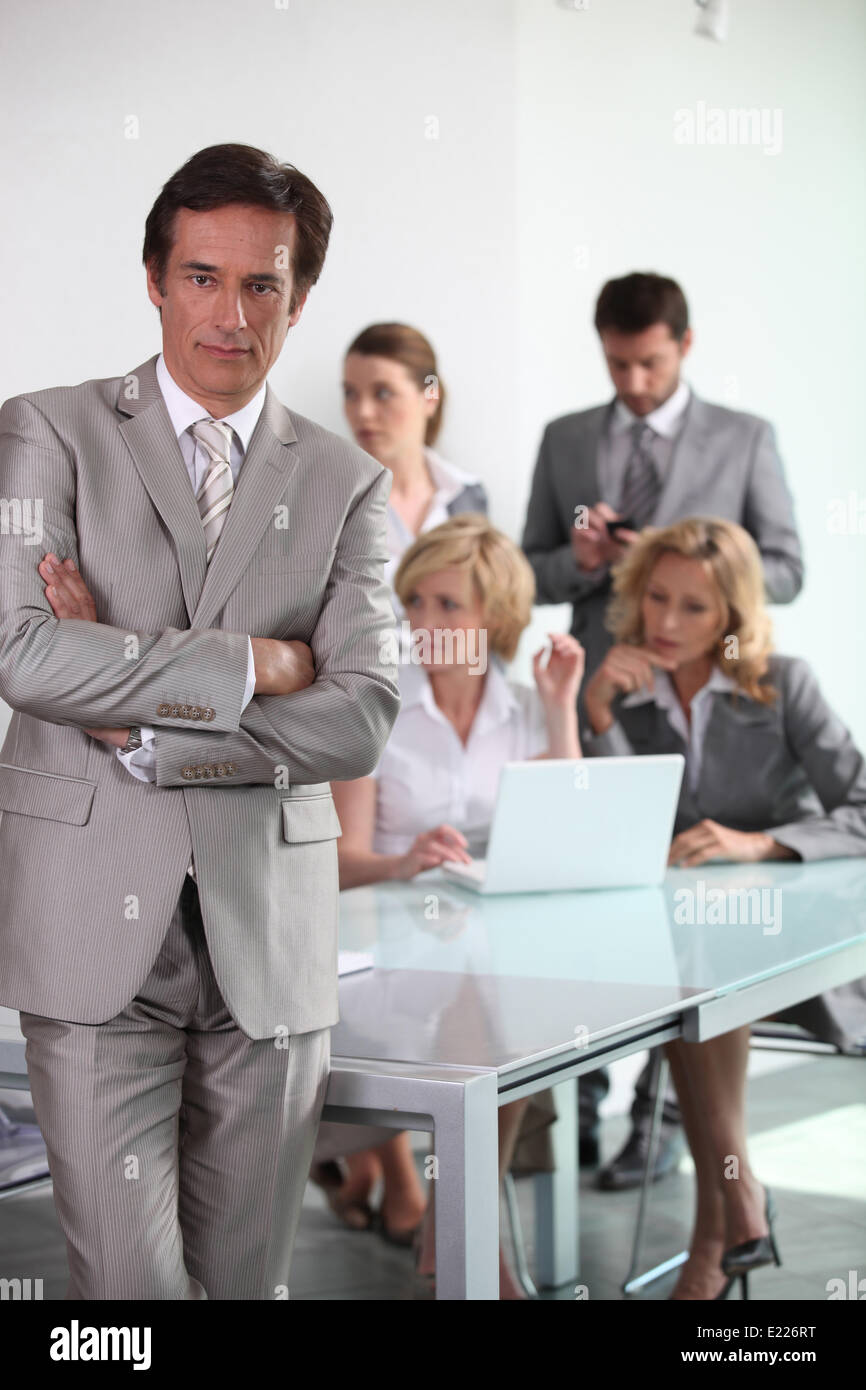 Manager and his business team Stock Photo - Alamy