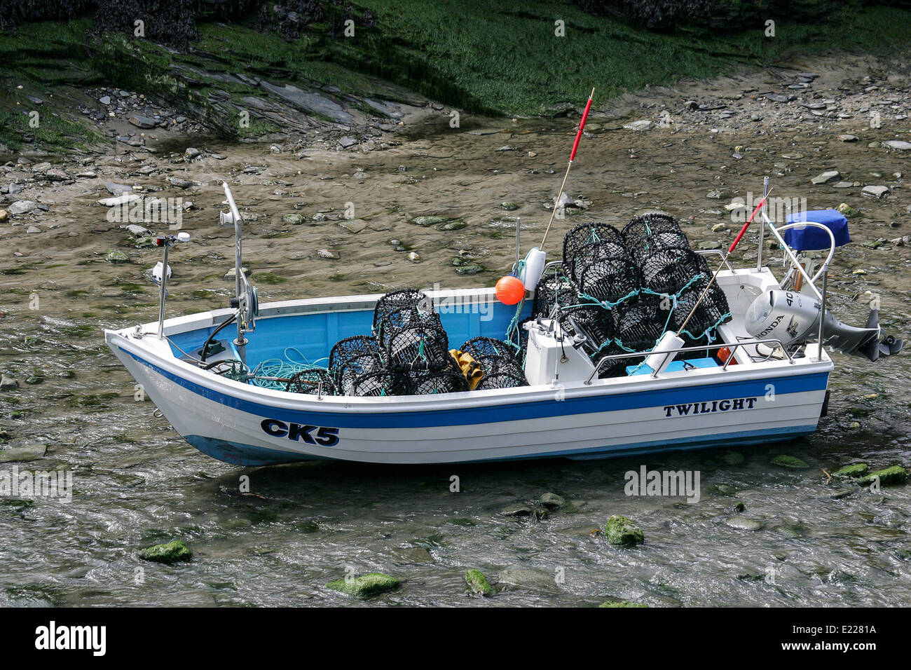 An inshore fishing boat, loaded with crab and lobster pots, in ...