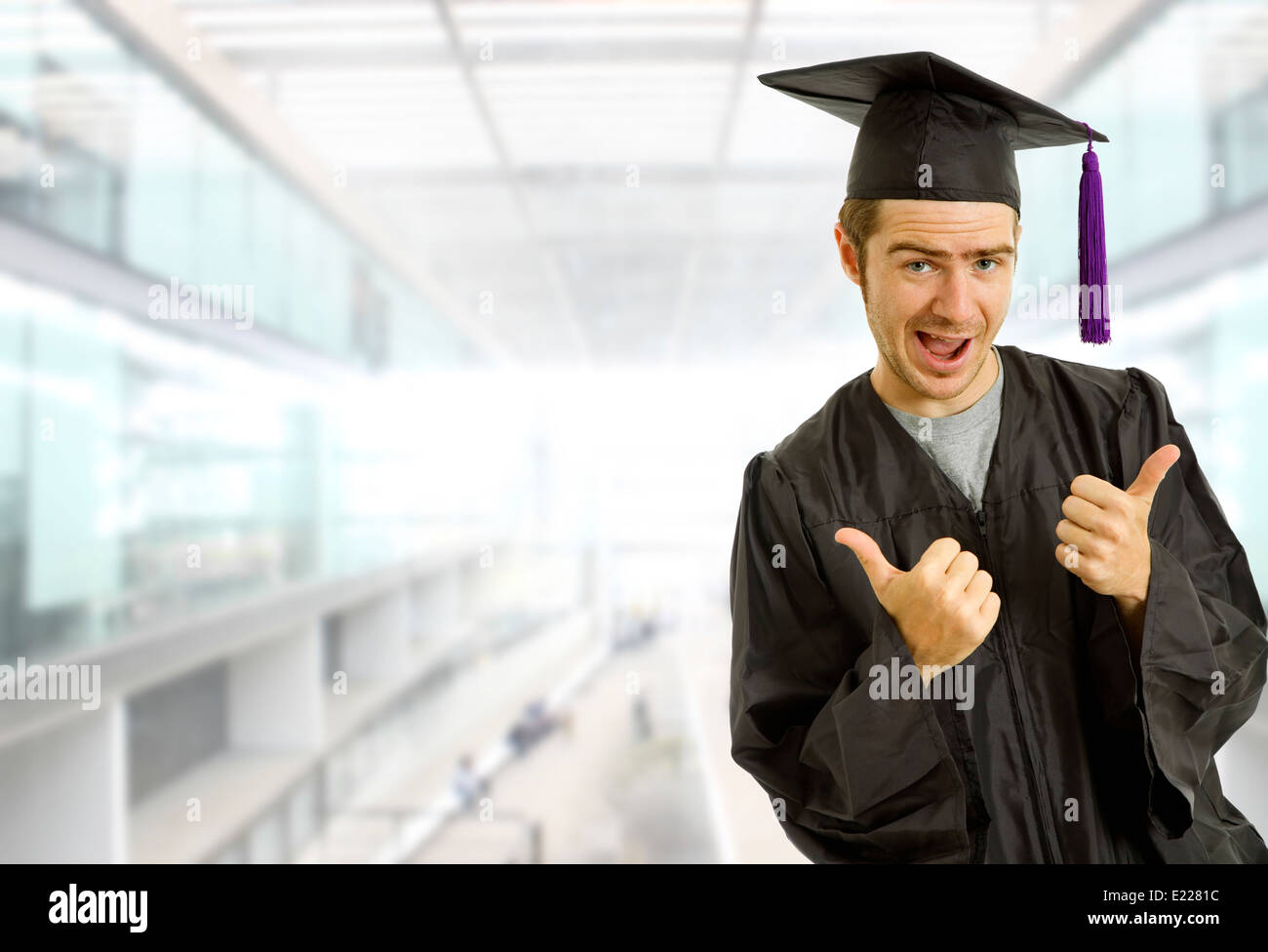 happy young man after his graduation at the office Stock Photo - Alamy