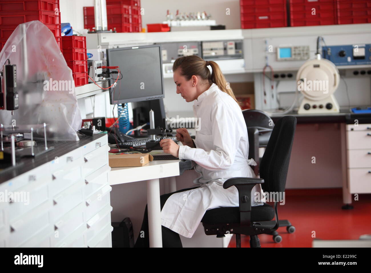 Female scientist in laboratory testing hi-res stock photography and ...
