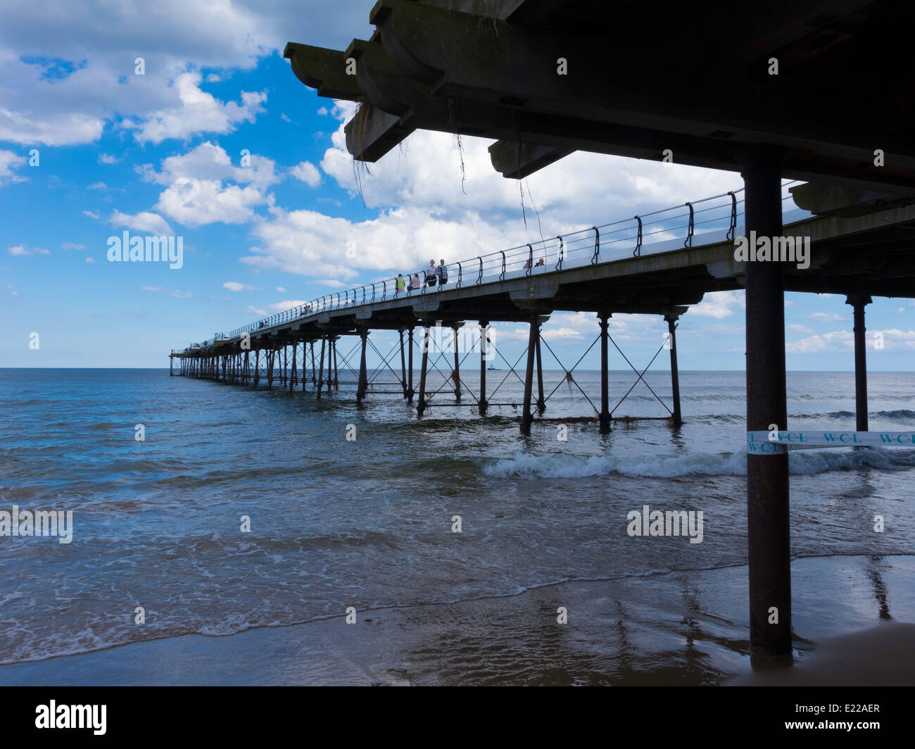 People enjoying early summer sunshine walking on Saltburn Pier Stock ...