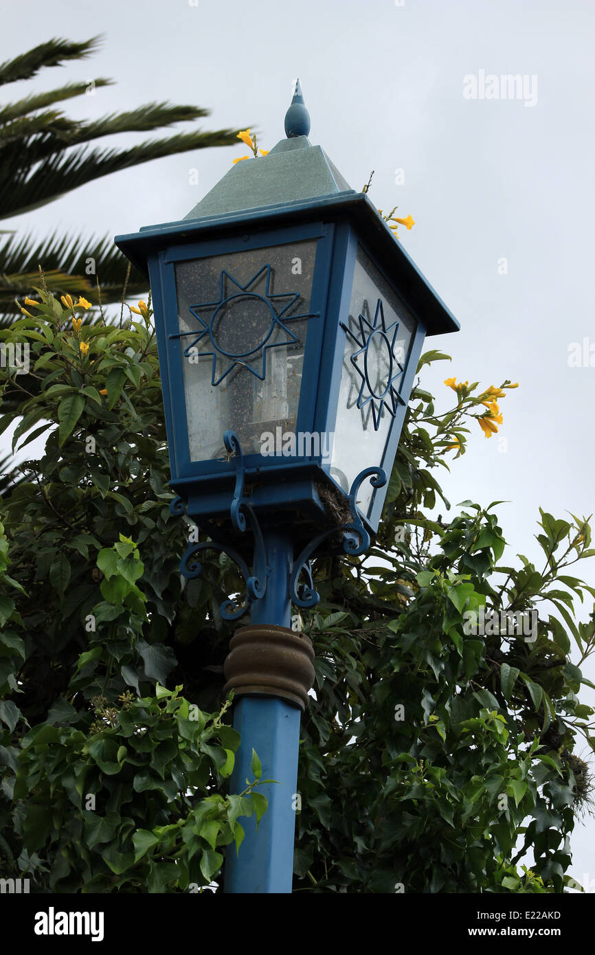 A blue lamp post in a park in Cotacachi, Ecuador Stock Photo - Alamy
