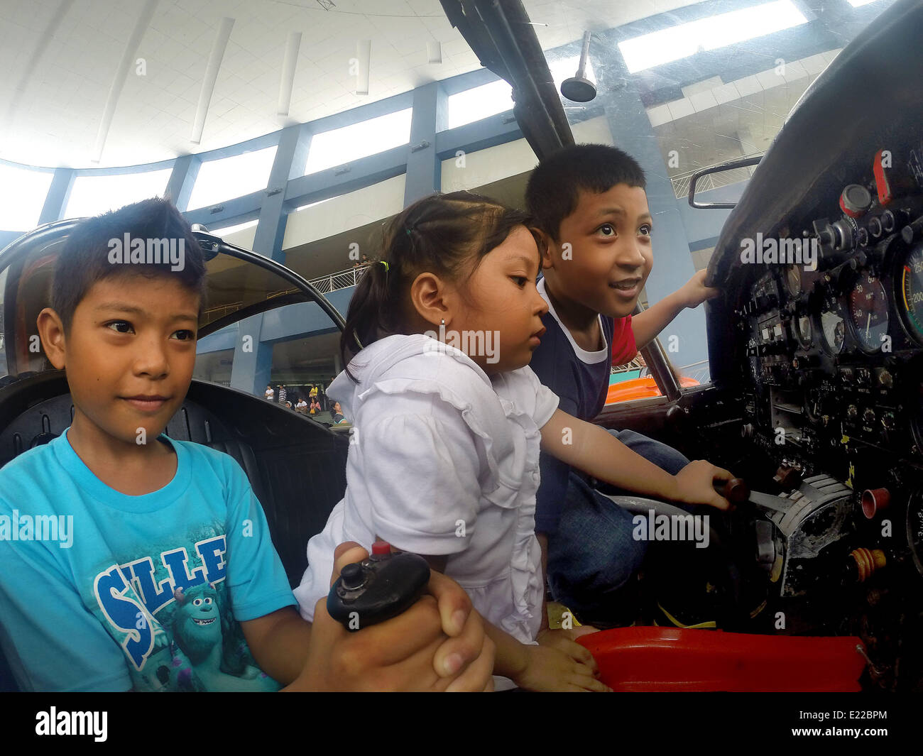 Pasay City, Philippines. 13th June, 2014. Children play inside the ...
