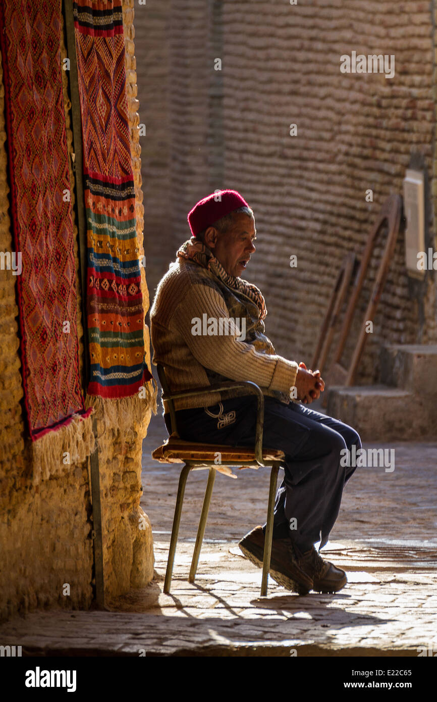 A trader in front of his craft store Stock Photo - Alamy