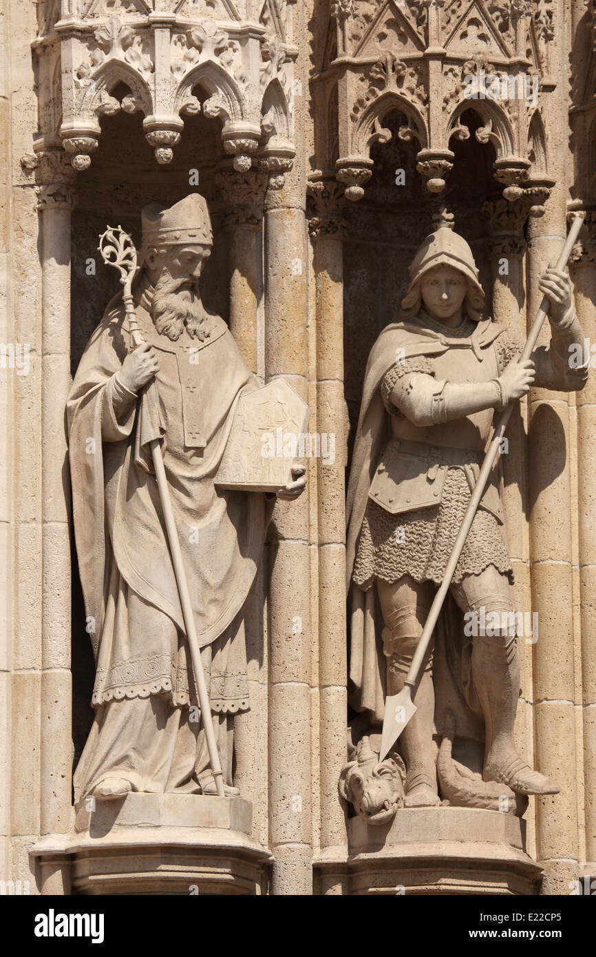 Sculpted figures of a priest and St George on the facade of Zagreb ...