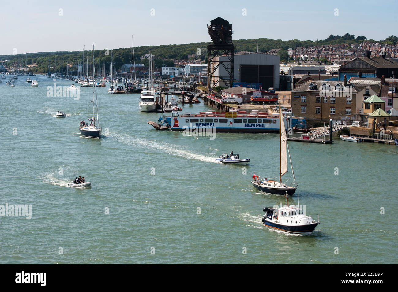 Boats sailing past the chain ferry between East and West Cowes on the ...