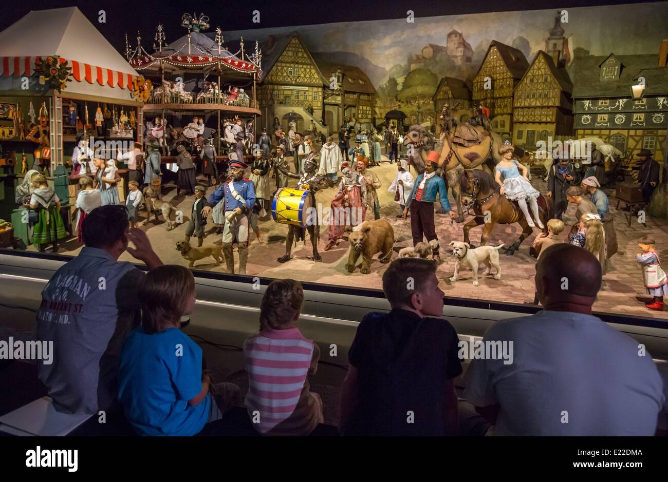Visitors look at the life-sized carnival figures, which represent ...