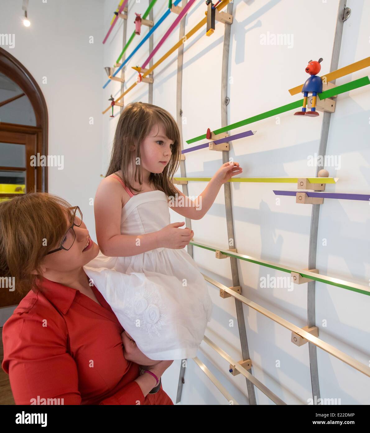 Six-year-old Emily and her mother play at the German Toy Museum in ...