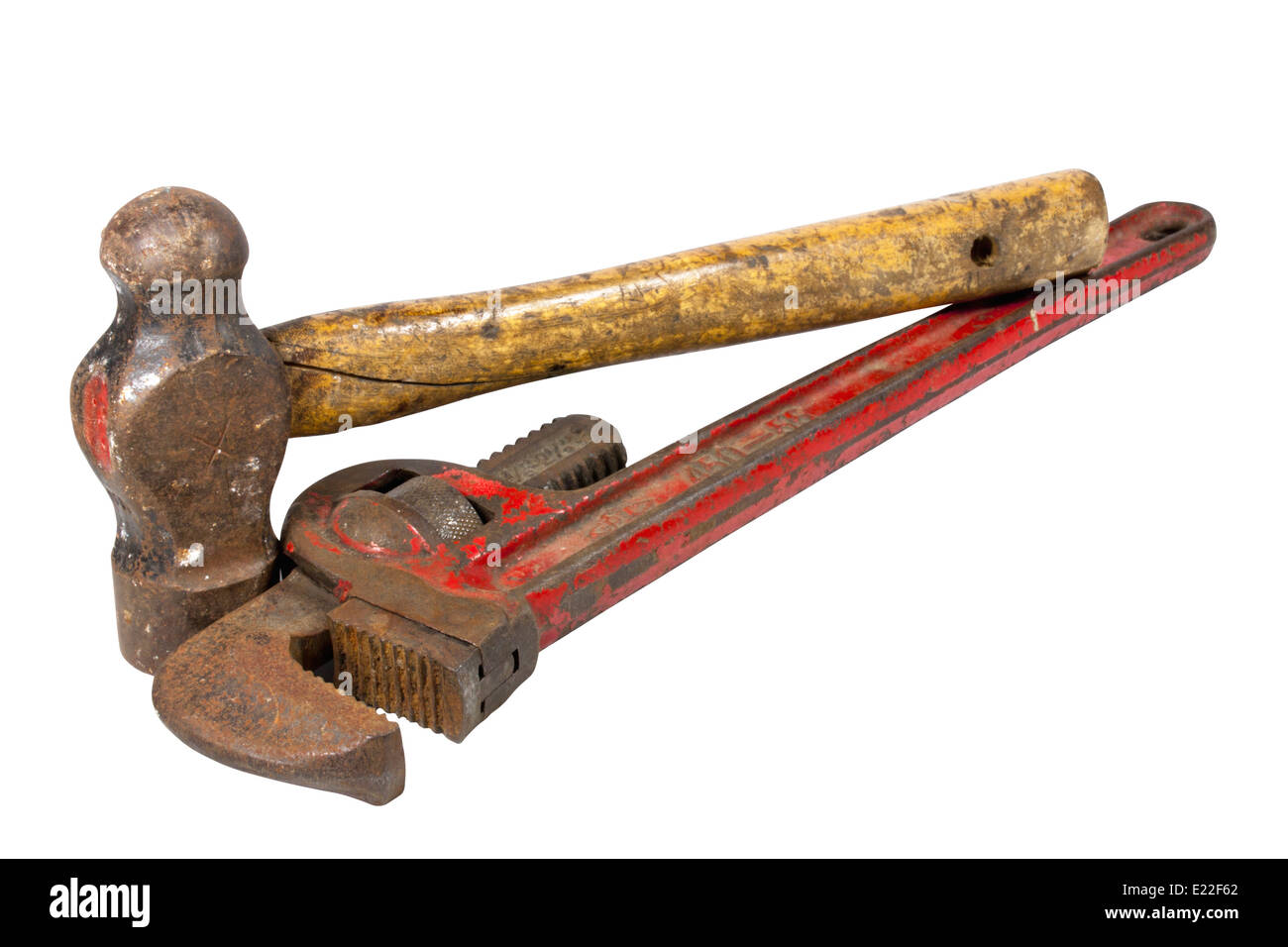 well used monkey wrench and ball peen hammer Stock Photo - Alamy