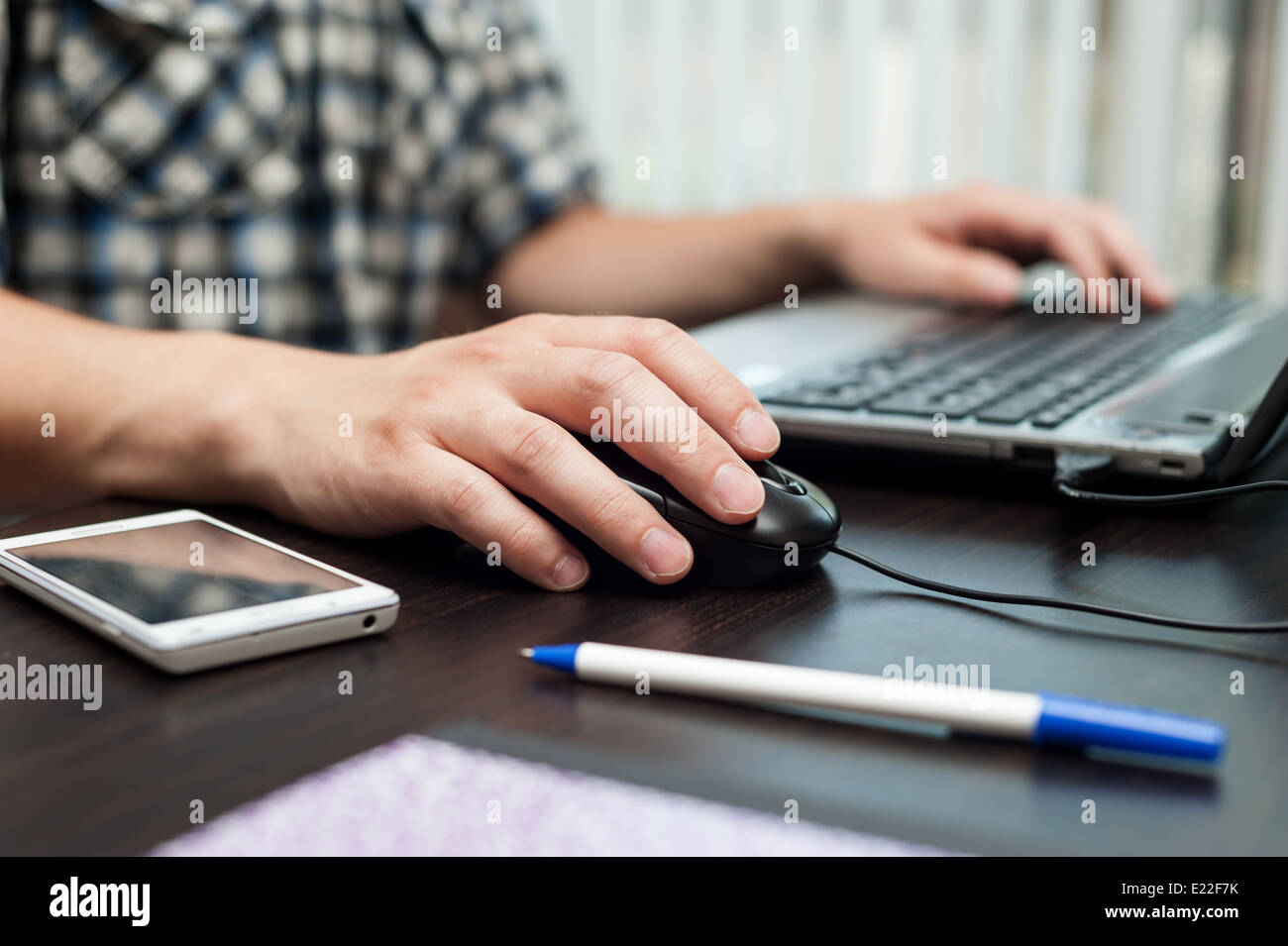 Hand holding computer mouse keyboard hi-res stock photography and ...