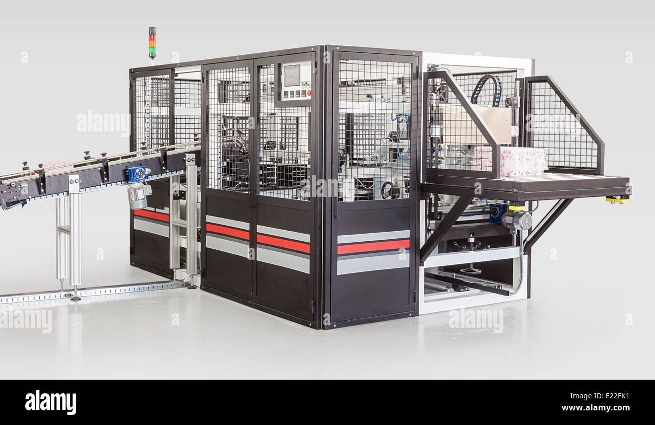 Industrial machine for napkin wrapping, contemporary technology Stock ...